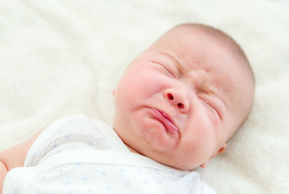 Newborn Baby Cries Once Put on Bed: Why and What to Do | New Health Advisor